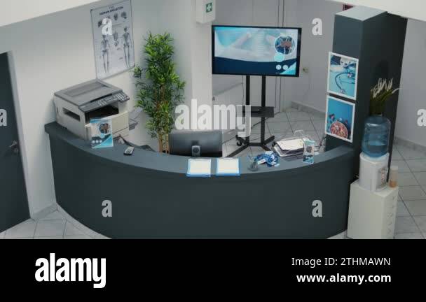 No people at hospital reception desk with counter in lobby to help with ...