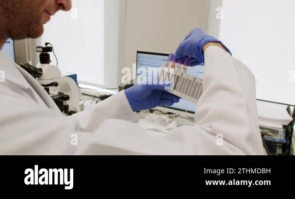 Blood Test Machine with tubes. A blood test with computer equipment ...