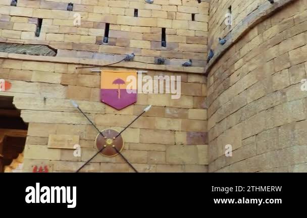 heritage fort entrance gate with kingdom flag from flat angle shot is ...