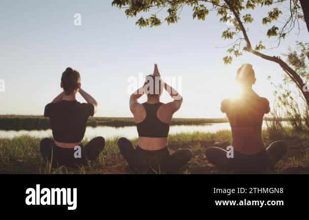 Silhouette of diverse group of three female together going, sitting in ...