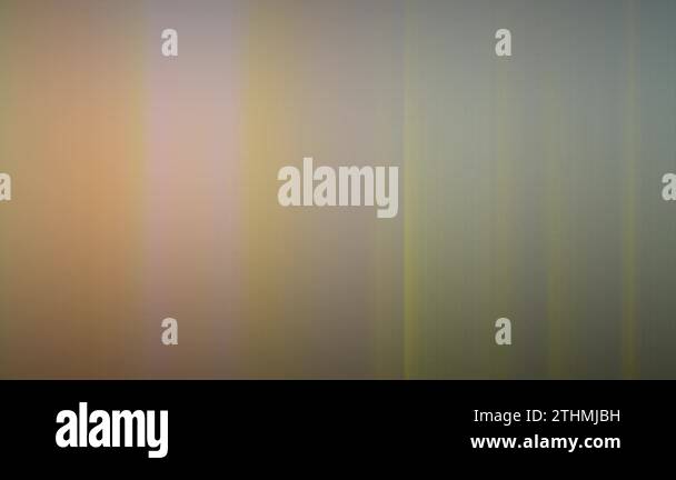 Abstract blurred colorful background with vertical lines changing shape and color. Textured ...