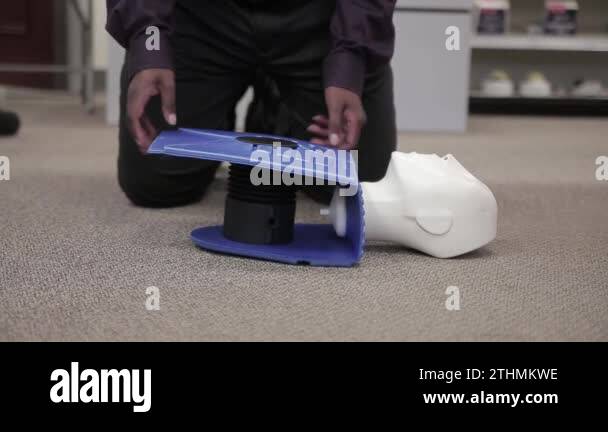 Staff is practicing CPR first aid with the AED with adult and infant ...