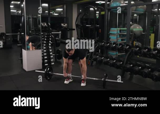 Weight lifting, Strength training, Exercise variety. Man lifts weights ...