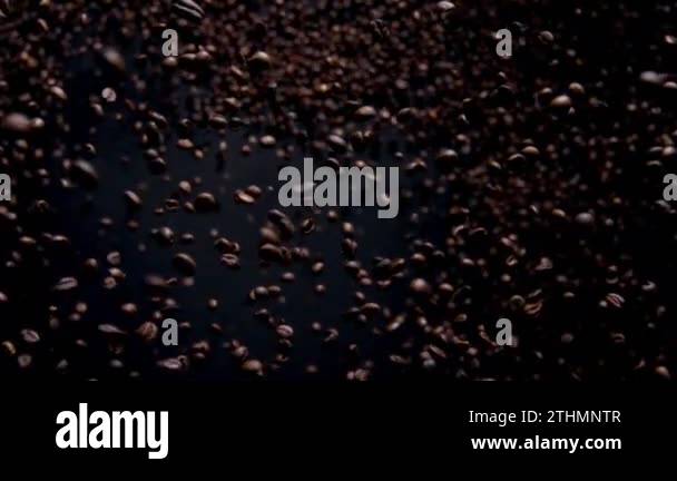 Beautiful downfall roasted coffee seeds close up. Fresh aromatic beans ...