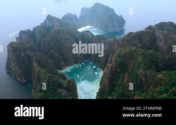 Drone aerial view iconic Maya Bay and Pi Leh Bay surrounded by ...