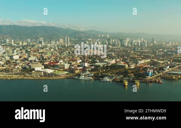 Cityscape: Cebu city with modern buildings, skyscrapers and seaport ...
