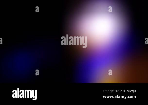 A blurred white lantern and a flashing police siren on a black ...