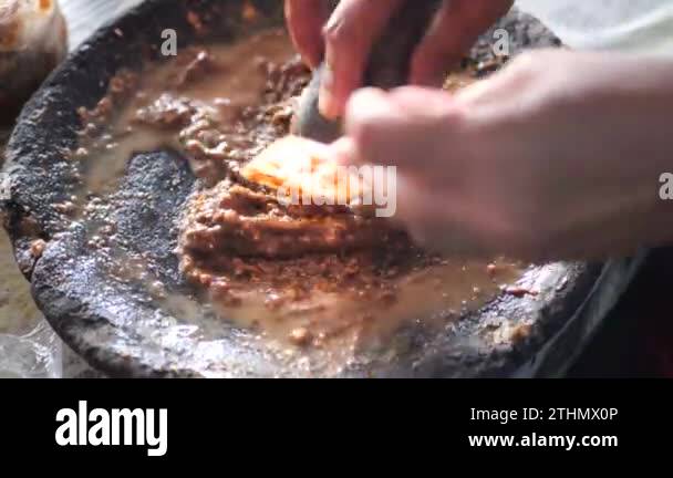 Preparing rujak petis.Rujak petis is traditional food from Java made ...