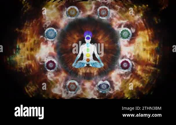 Silhouette with chakras meditating over beautiful animated mandala ...