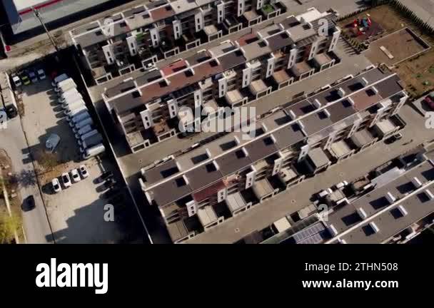 modern residential neighborhood with houses on the ground, playground ...