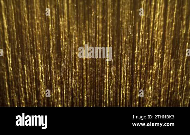 Abstract Gold Filaments Bursting Background/ 4k animation of an ...