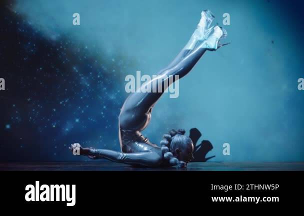 Flexible Woman Contortionist Wearing Shiny Outfit and High Heels ...
