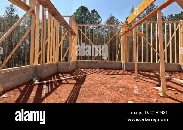 Stick house was built using combination of timber beams and truss ...