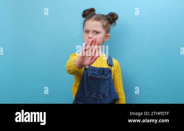 Angry preteen girl kid say No hold palm folded crossed hands, warning ...