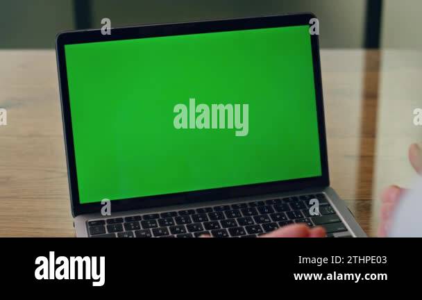 Lady hands videocalling chromakey computer at table closeup. Unknown ...