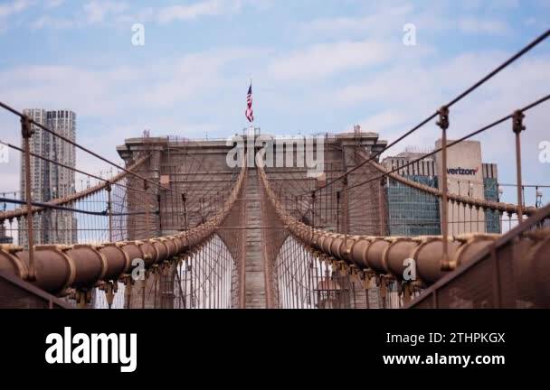 Perspective View of Brooklyn Bridge Towers with American National Flag ...