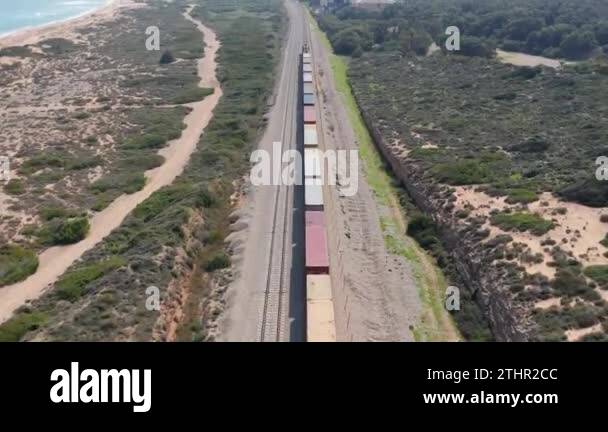 cargo containers on the railroad. Intermodal container in a train ...