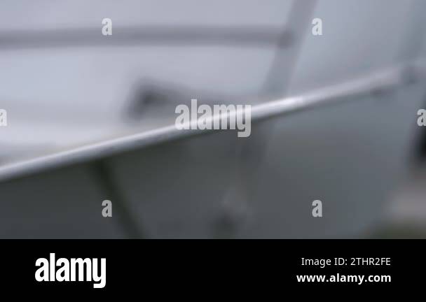 Closeup white airplane wing of personal small lightweight plane parked ...