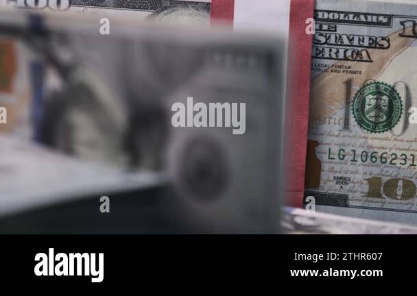 Stacks of dollars rotate close-up. Bundles of 10000 American dollars ...