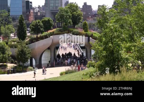 New York, NY - June 26th, 2022: Tourists and locals cross the ...
