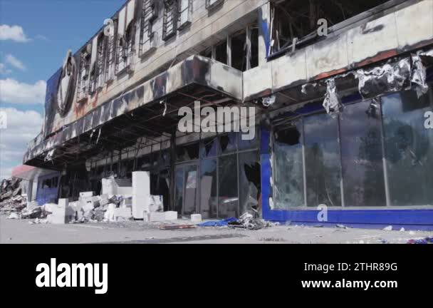 This stock video shows a destroyed building of a shopping center in ...