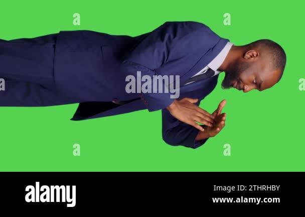 Vertical video: Side view of displeased employee doing timeout pause ...