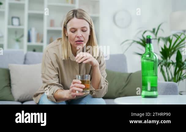 Woman drinking alcohol on sofa Stock Videos & Footage - HD and 4K Video ...