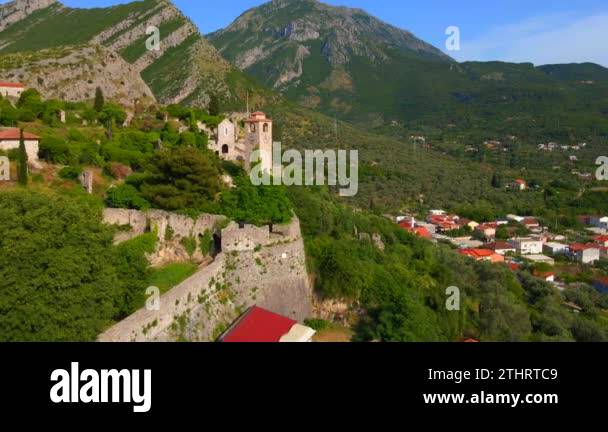 The drone footage captures the stunning ruins of Stari Bar, with stone ...