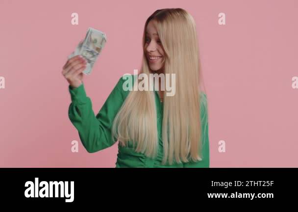 Rich pleased boss woman waving money dollar cash banknotes bills like a ...