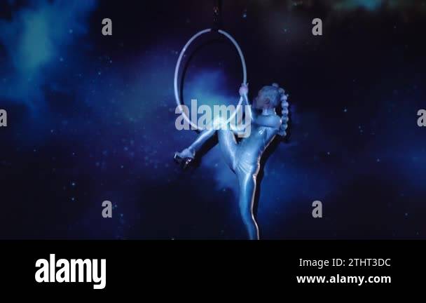 Flexible Woman Contortionist Wearing Shiny Outfit and High Heels ...