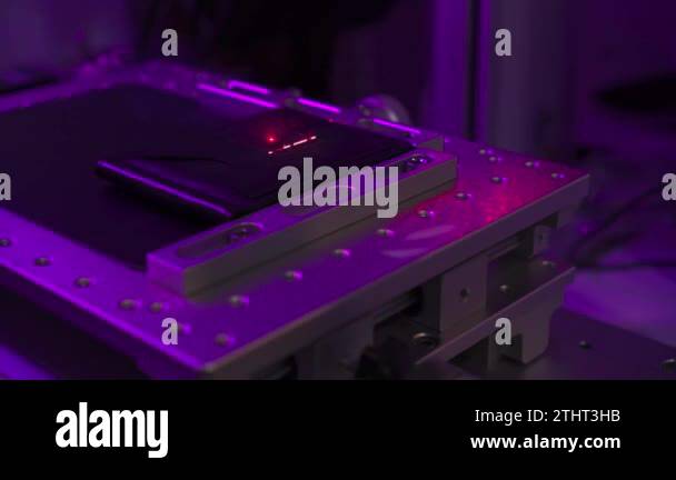 Laser engraving process camera passing by horizontally,working platform ...