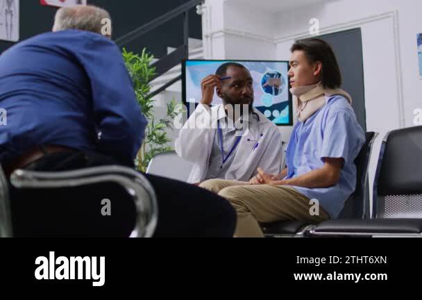 African american doctor doing brain damage exam, checking concussion ...