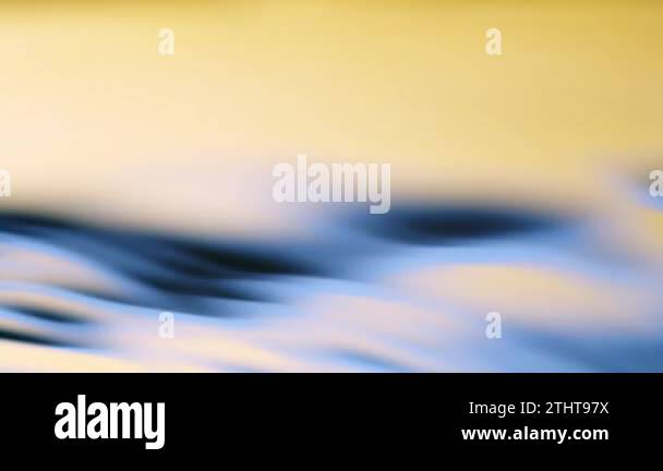 Water surface yellow and blue texture with clean ripples and wave ...