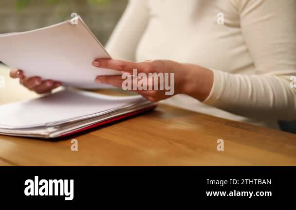 Employee business woman hands working in stacks paper files for ...