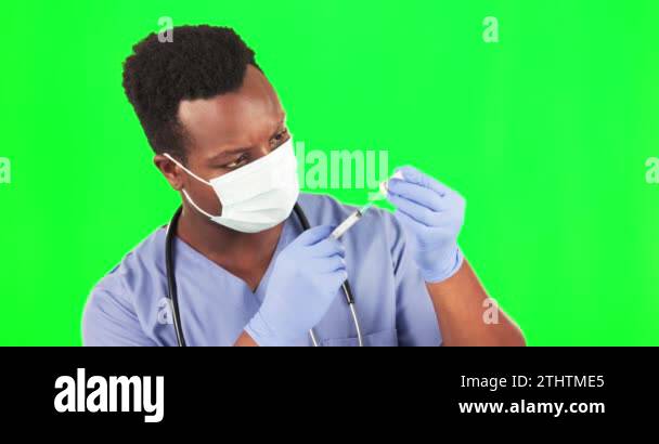 Medical, vaccine and covid with black man on green screen for ...