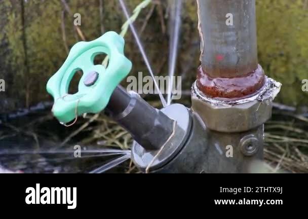 Defect agricultural irrigation system shows water leakage under high ...