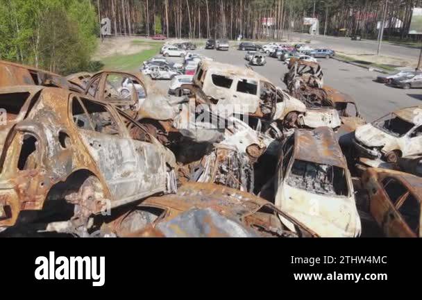 This stock video shows a dump of shot and burned cars in Irpin, Bucha ...