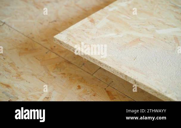 Cropped osb sheet close-up. Oriented strand board on the floor, custom ...