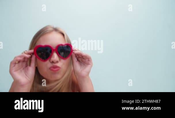 Cute blond girl making duck face Stock Video Footage - Alamy