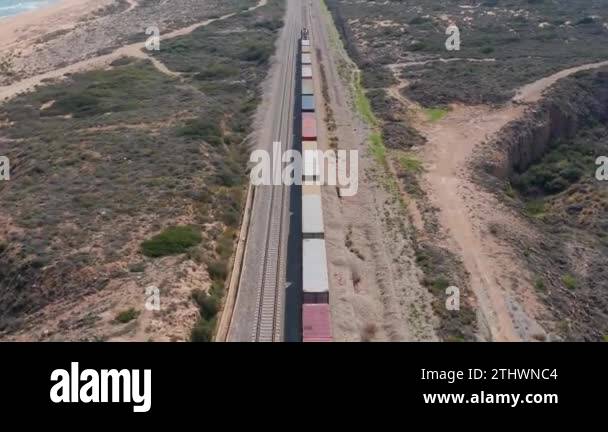 cargo containers on the railroad. Intermodal container in a train ...