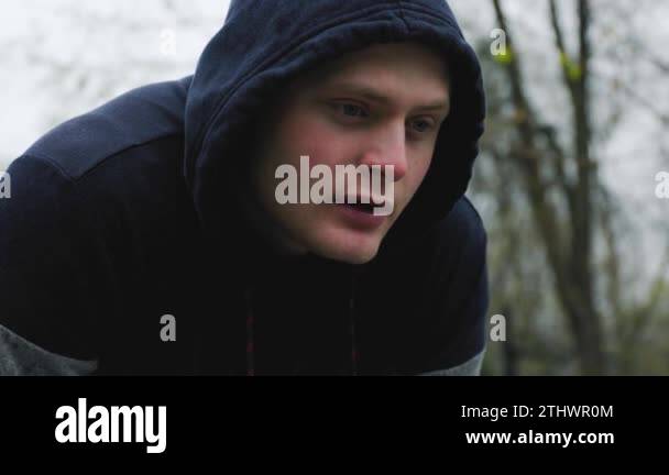 Endurance of a Sportsman Portrait of a Caucasian Athlete in the Rain. A ...