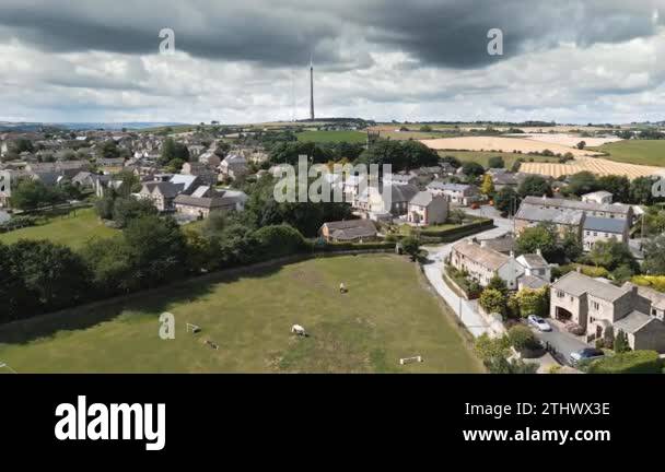 Traditional English village rural scene. Aerial footage of village ...