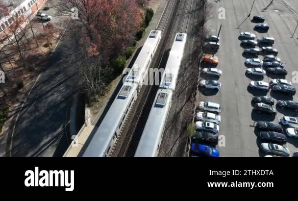 An aerial view of two trains meet each other in a train station of Clifton City Stock Video ...