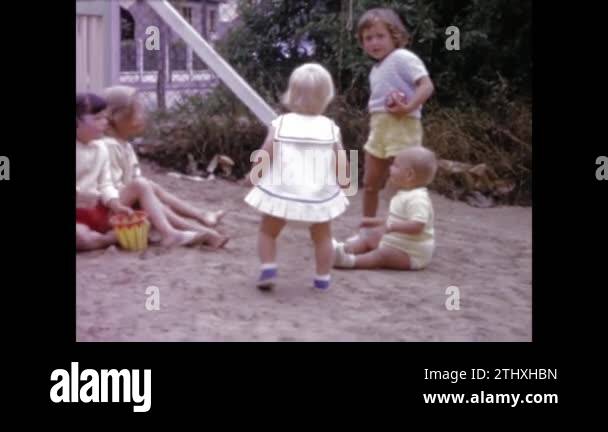 Paris, France june 1958: Footage of young children playing with beach ...
