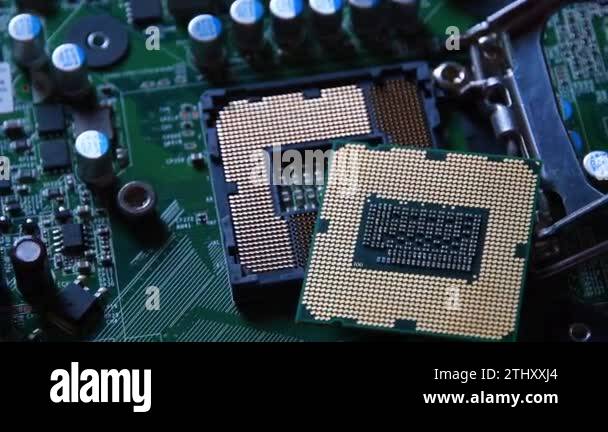 Detail of a CPU Processor over his Socket on a Motherboard. Printed Circuit Board - Computer ...