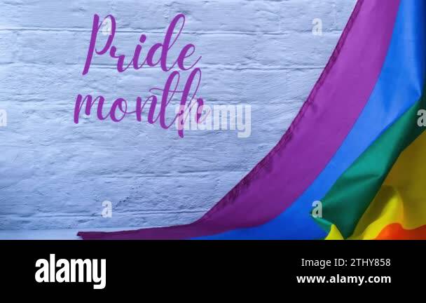 4k zoom in out Rainbow flag with text PRIDE MONTH message. Rainbow ...