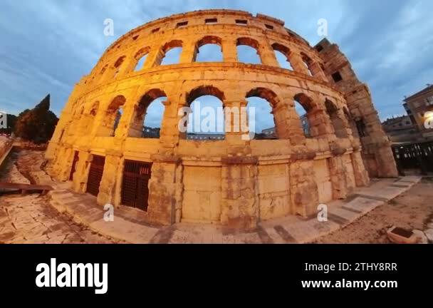 Pula Amphitheater at night, also known as Coliseum of Pula, is a well ...