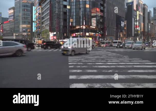 Tokyo Ginza District in Japan. Intersection with Public Transport and ...
