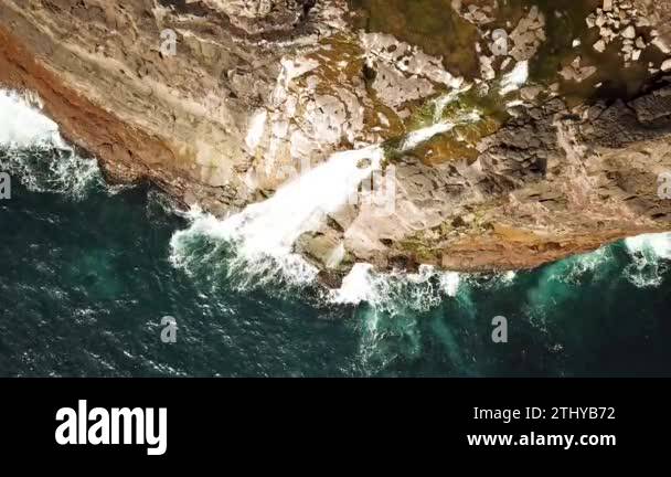 Aerial view of Bosdalafossur waterfall near Slave cliff or Traelanipan ...