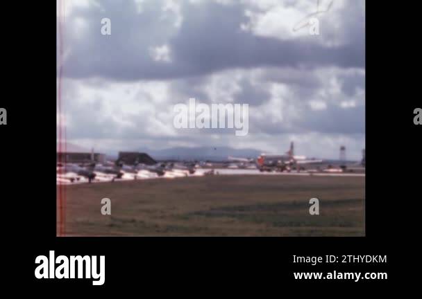 Group of huge American military transport airplanes parked at air base ...